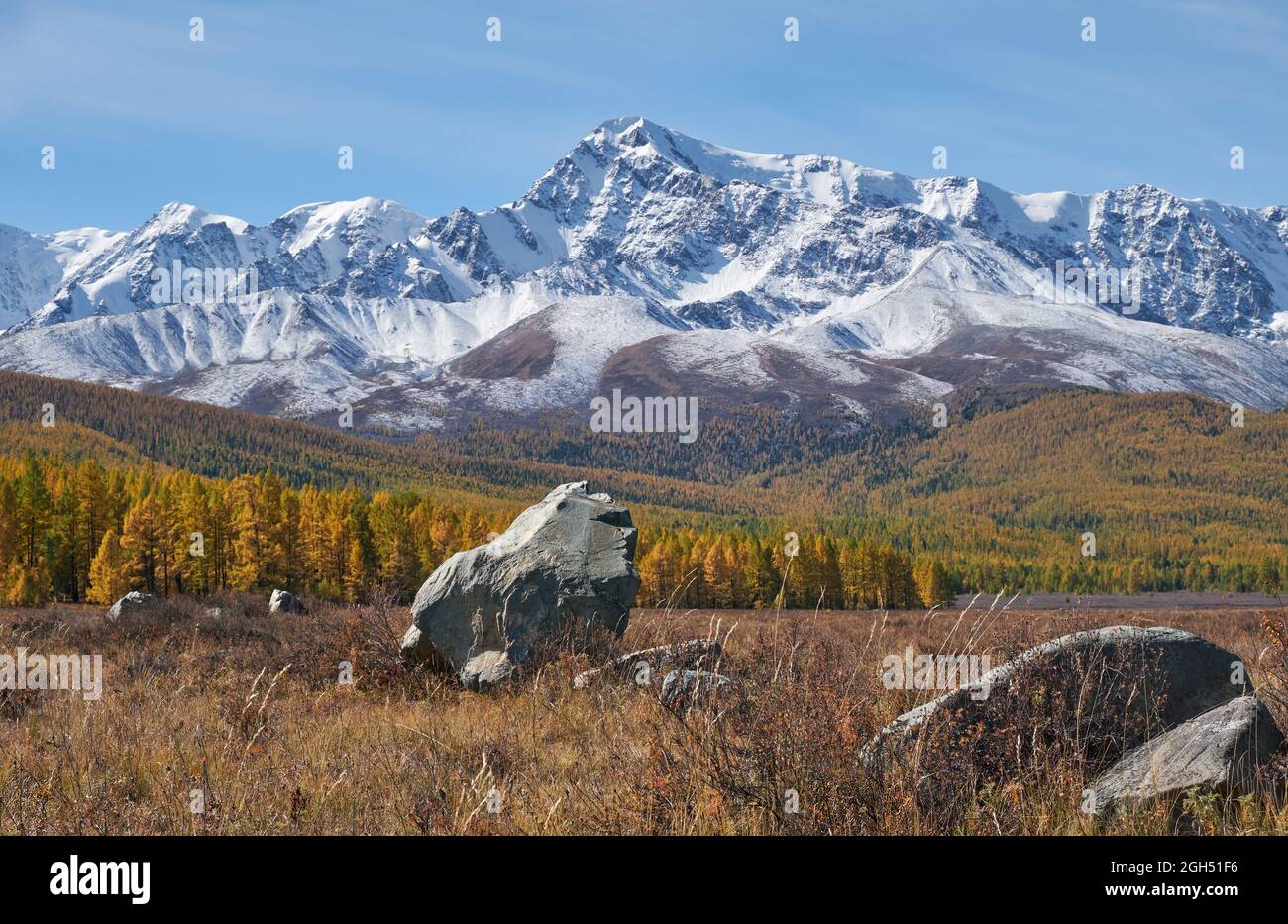 Autumn highland landscape. Picturesque boulders are on foreground and ...