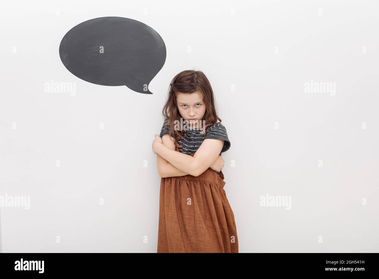 little kid over white wall depressed and worry for distress, crying ...