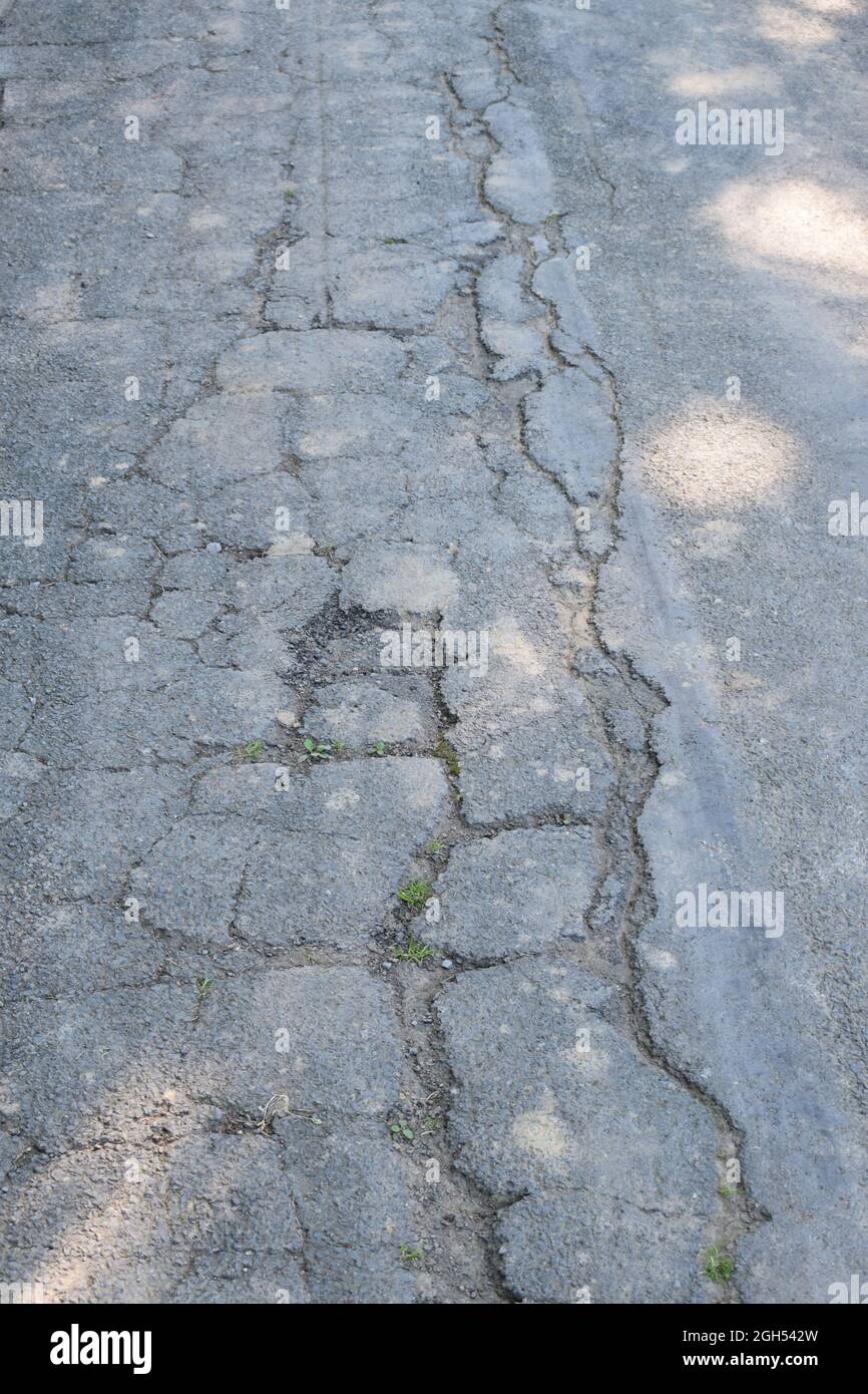 Rough road surface deterioration hi-res stock photography and images ...
