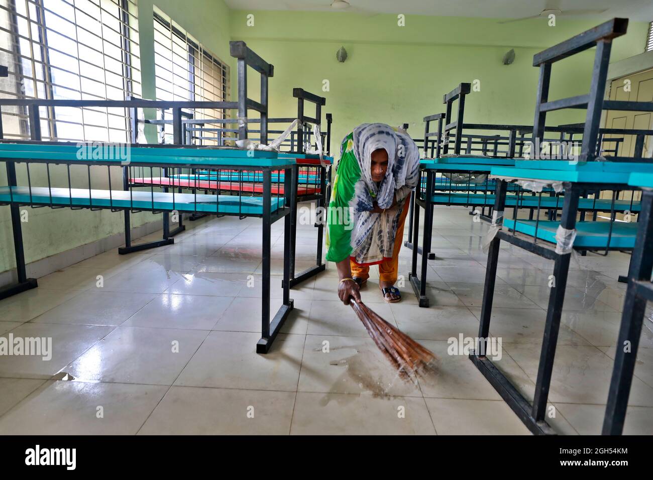 Dhaka, Bangladesh - September 05, 2021: Women are busy cleaning ...