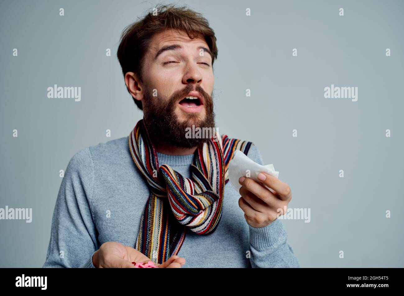 cold man wiping his nose with a handkerchief health problems isolated ...