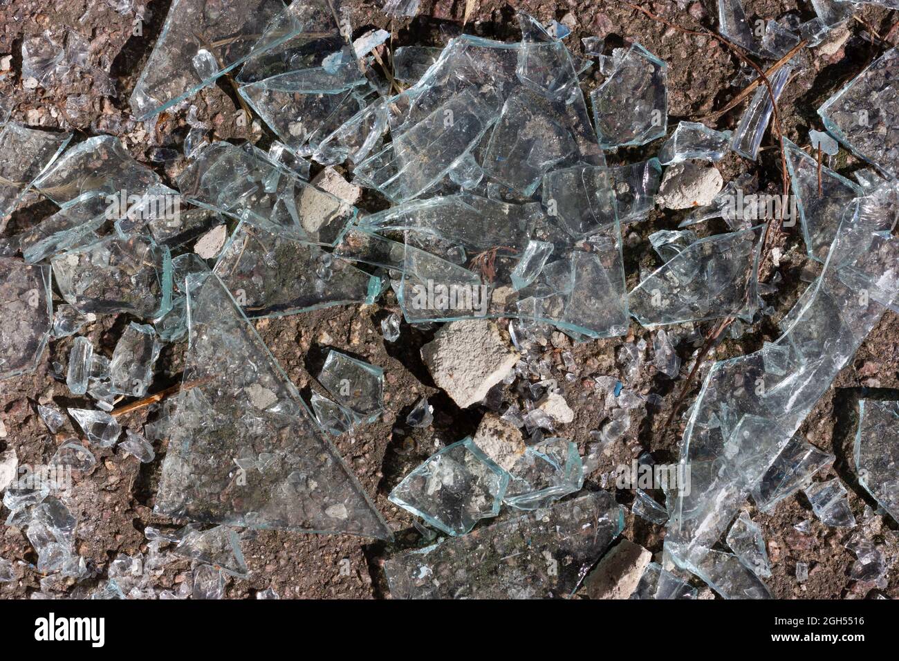 Broken glass. Pieces of broken glass. Sharp glass Stock Photo - Alamy