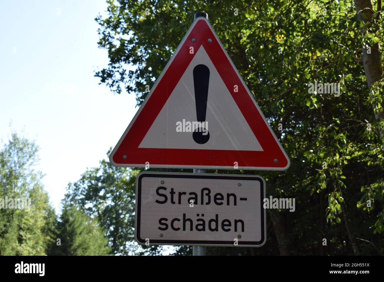 bad road warning sign Stock Photo - Alamy
