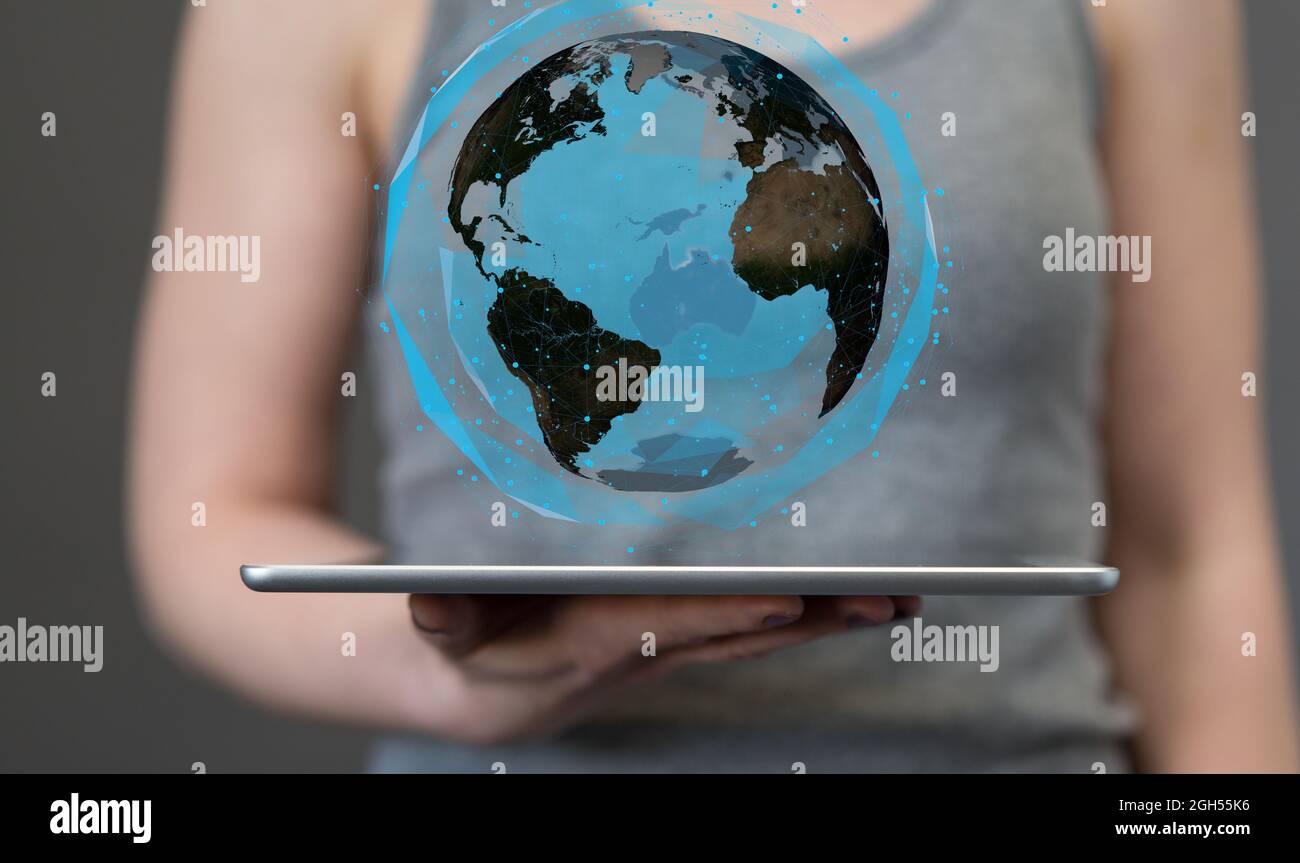 An illustration of a digital globe network on a tablet Stock Photo - Alamy