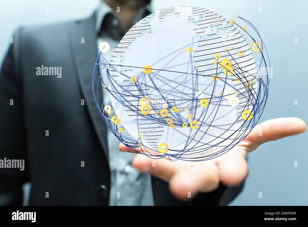 An illustration of a digital globe network in a hand Stock Photo - Alamy