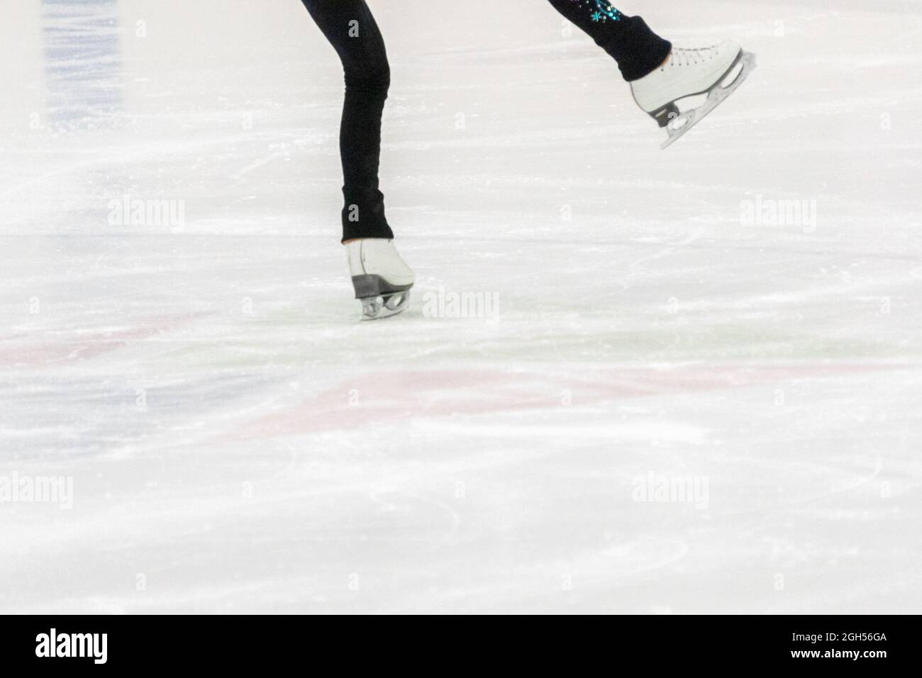 View of figure skater feet at the figure skating practice Stock Photo ...