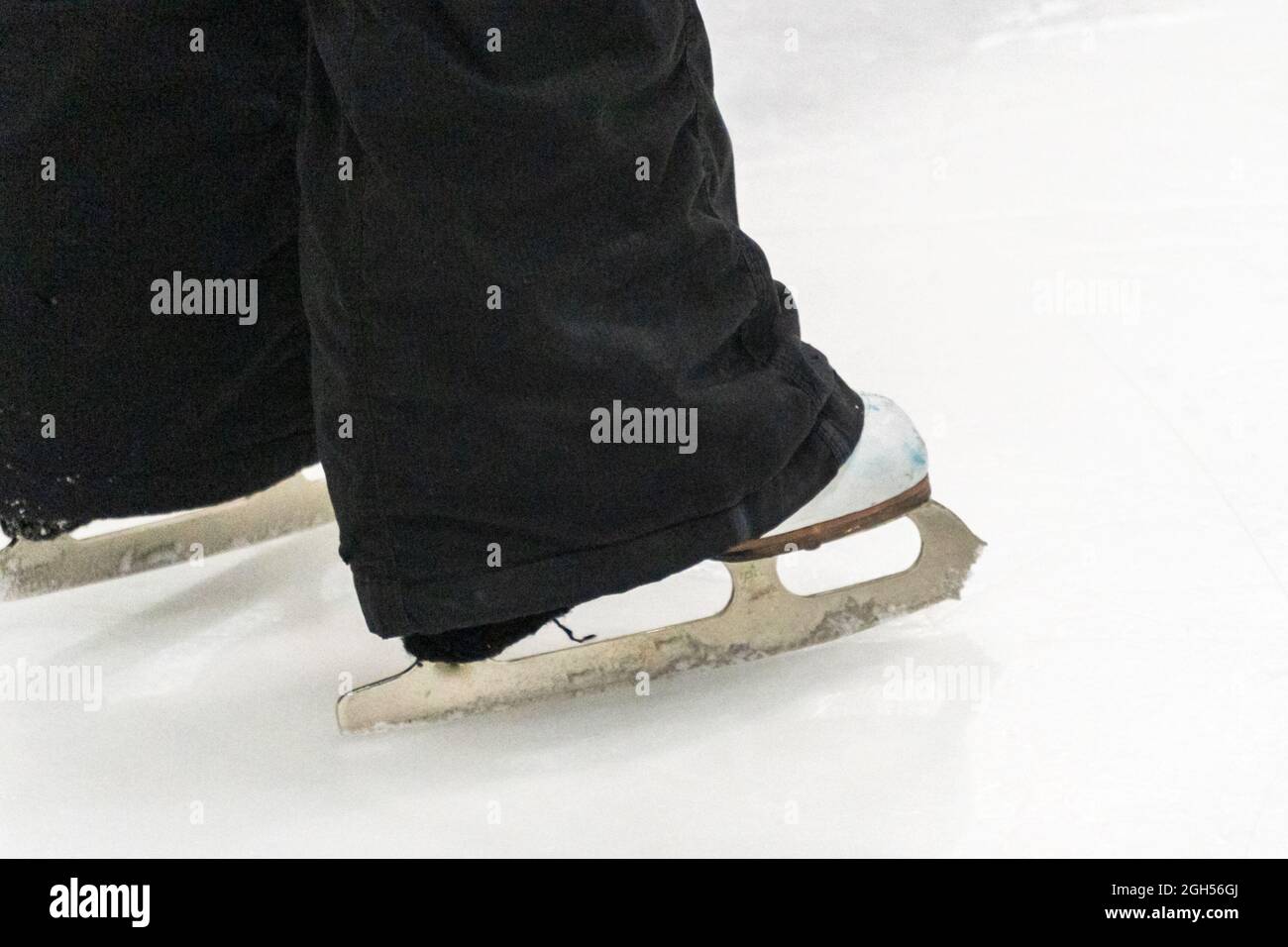 View of figure skating coach feet at the figure skating lesson Stock ...