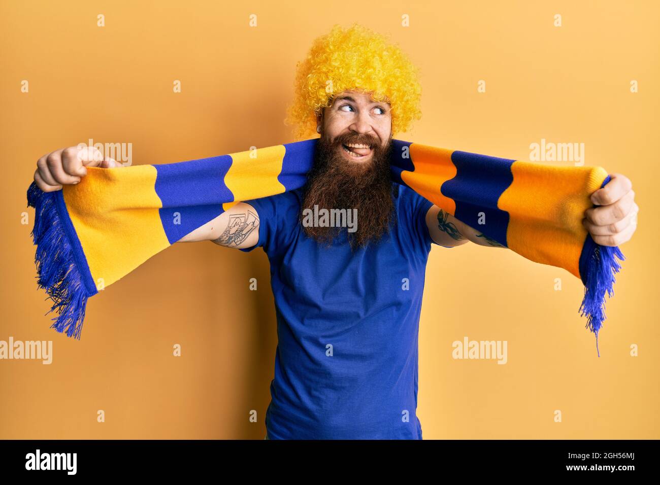 Redhead man with long beard football hooligan cheering game wearing ...