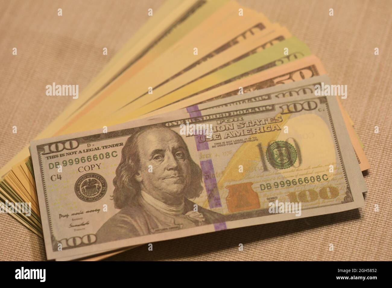 Assortment o cash in US currency Stock Photo - Alamy