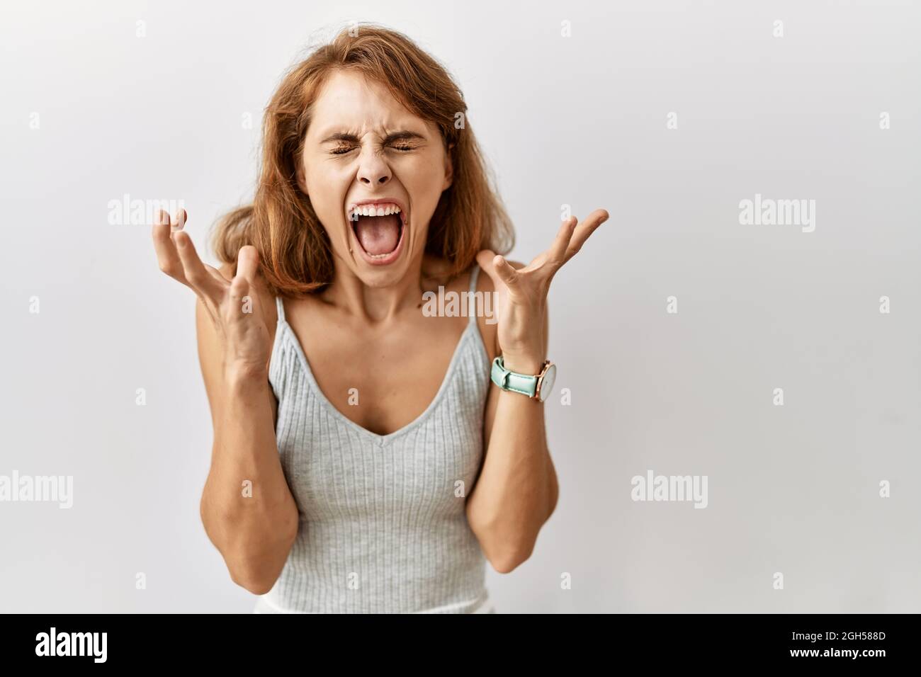 Beautiful caucasian woman standing over isolated background celebrating ...