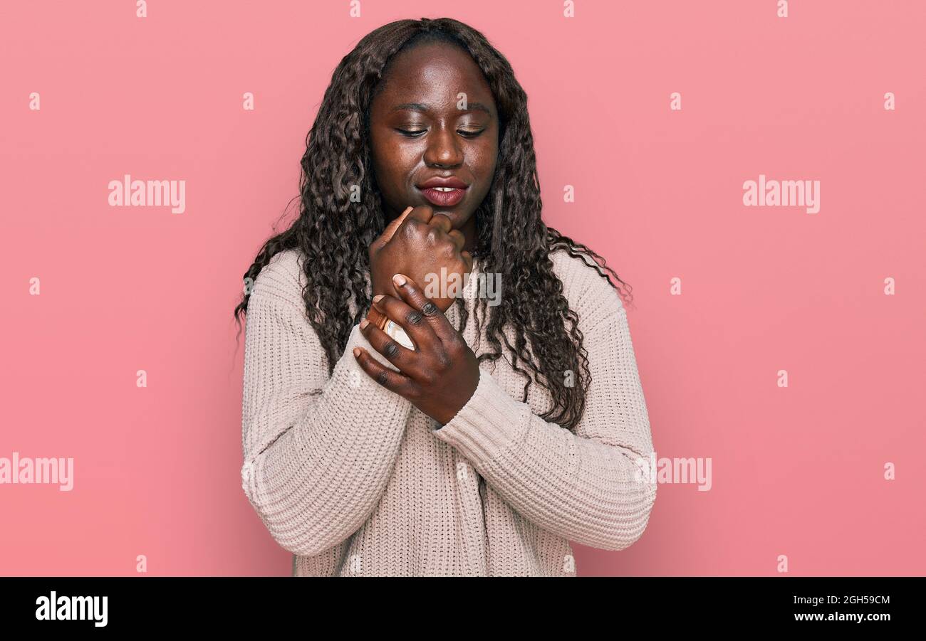 African painful wrist hi-res stock photography and images - Alamy