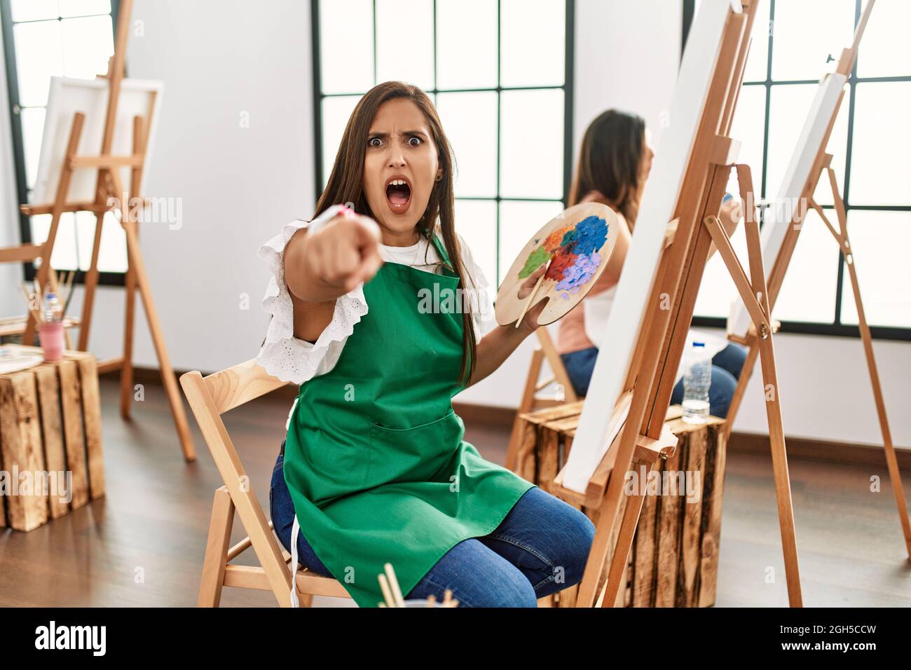 Girl unhappy painting classroom hi-res stock photography and images - Alamy