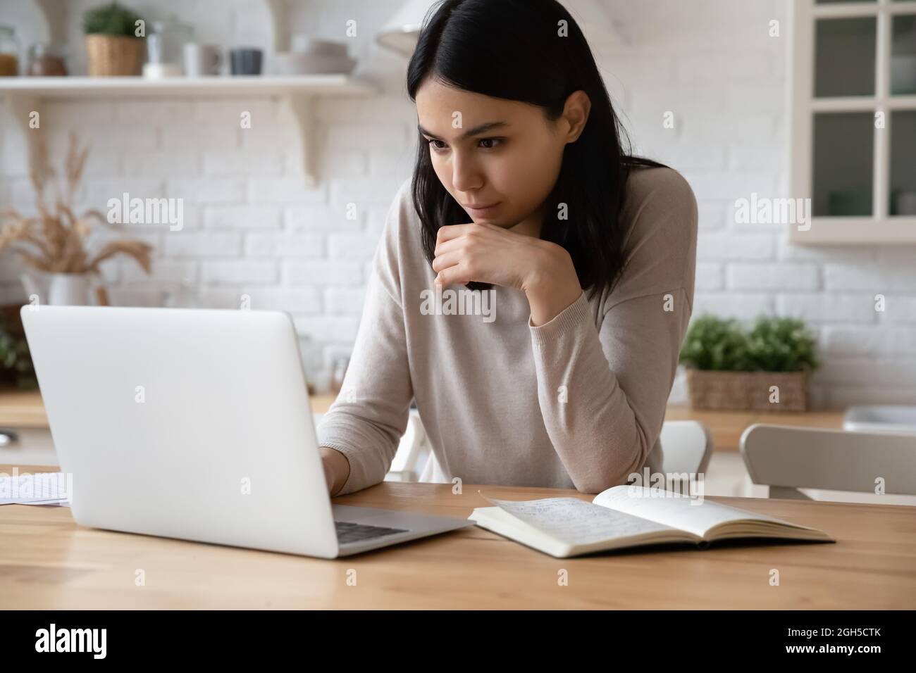 Happy beautiful young asian woman studying online using computer Stock ...