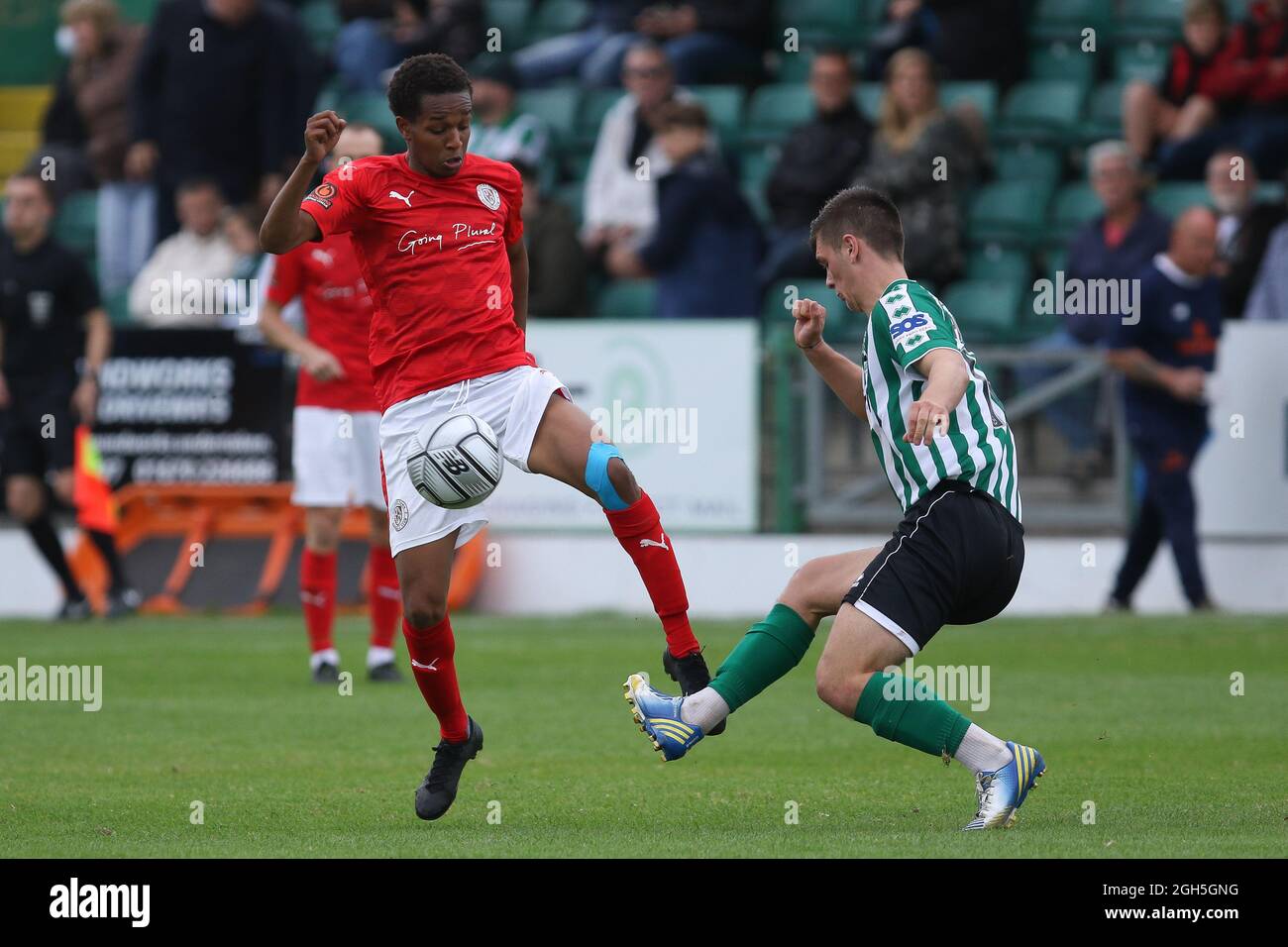 Twariq Yusuf of Brackley Town and Corey McKeown of Blyth Spartans in ...