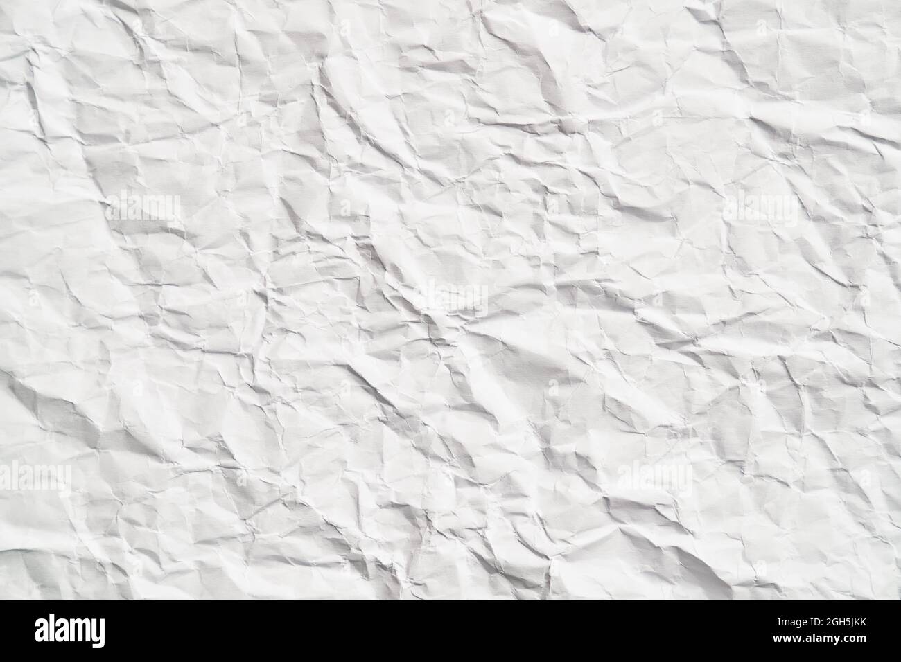 White crumpled paper texture with wrinkles. Damaged and torn sheet ...