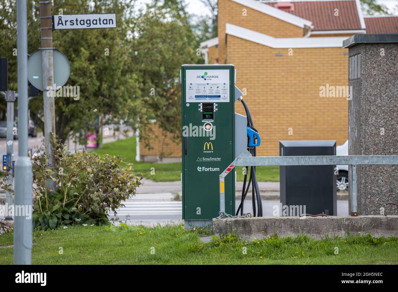 Beautiful view of charging station for electric car in front yard of ...