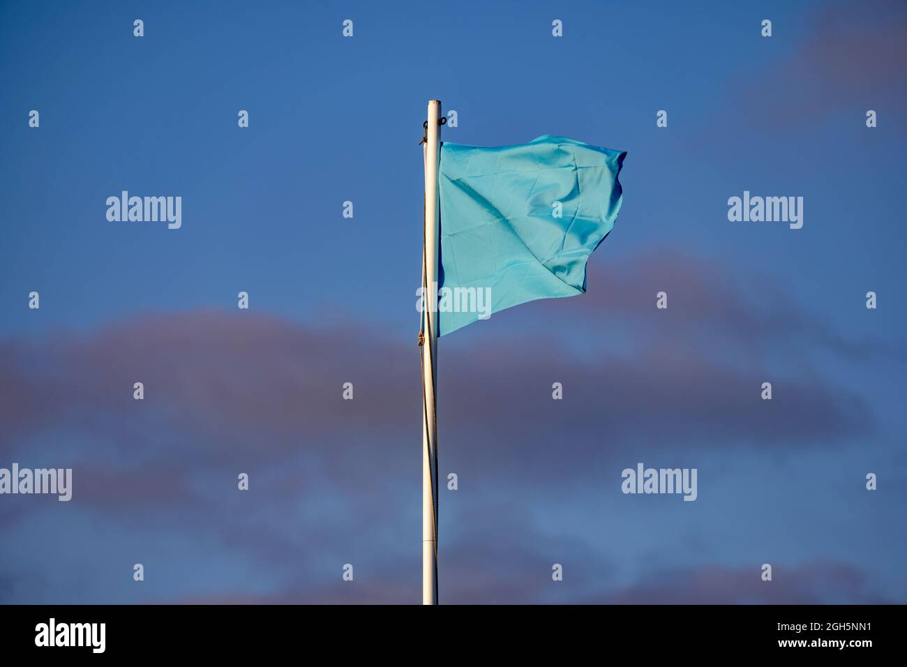 Turquoise coloured flag Stock Photo - Alamy