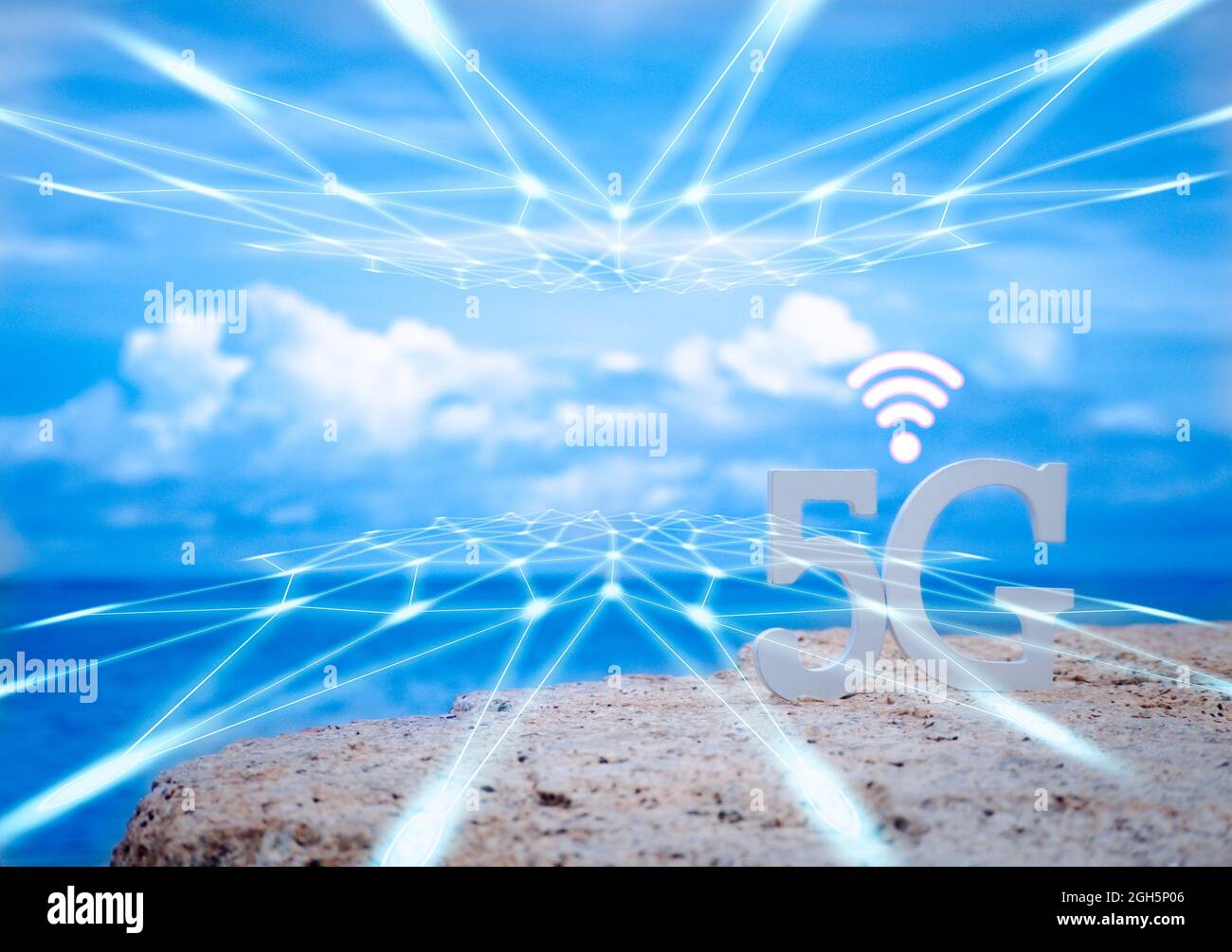 Symbol of white 5G with wifi and transmission network on stone seaside ...