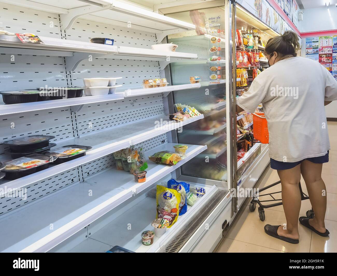 KANCHANABURI,THAILAND-AUGUST 11,2021 : Unidentified woman choose food ...