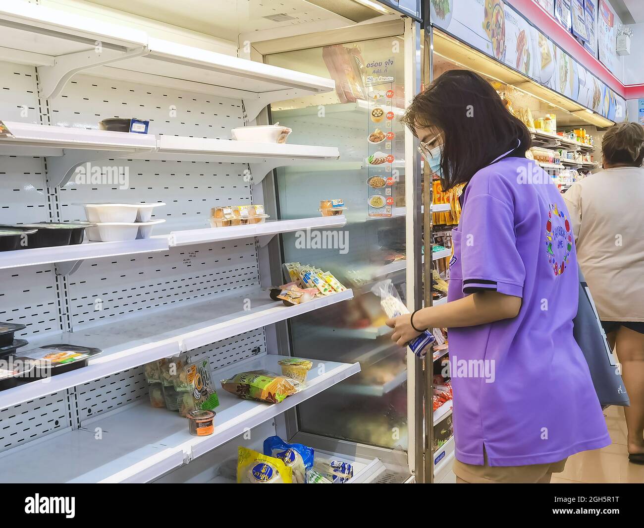 KANCHANABURI,THAILAND-AUGUST 11,2021 : Unidentified woman choose food ...