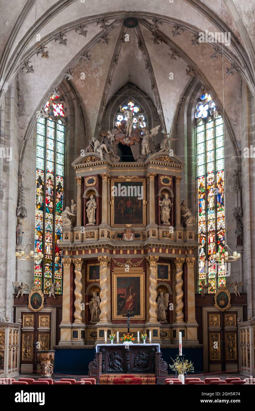 Interior of a church with a beautifully designed altar and colorful ...