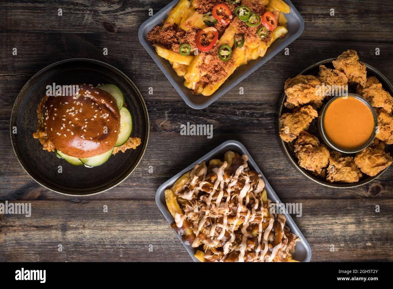 High angle of served table with tasty buffalo cheese fries placed near ...