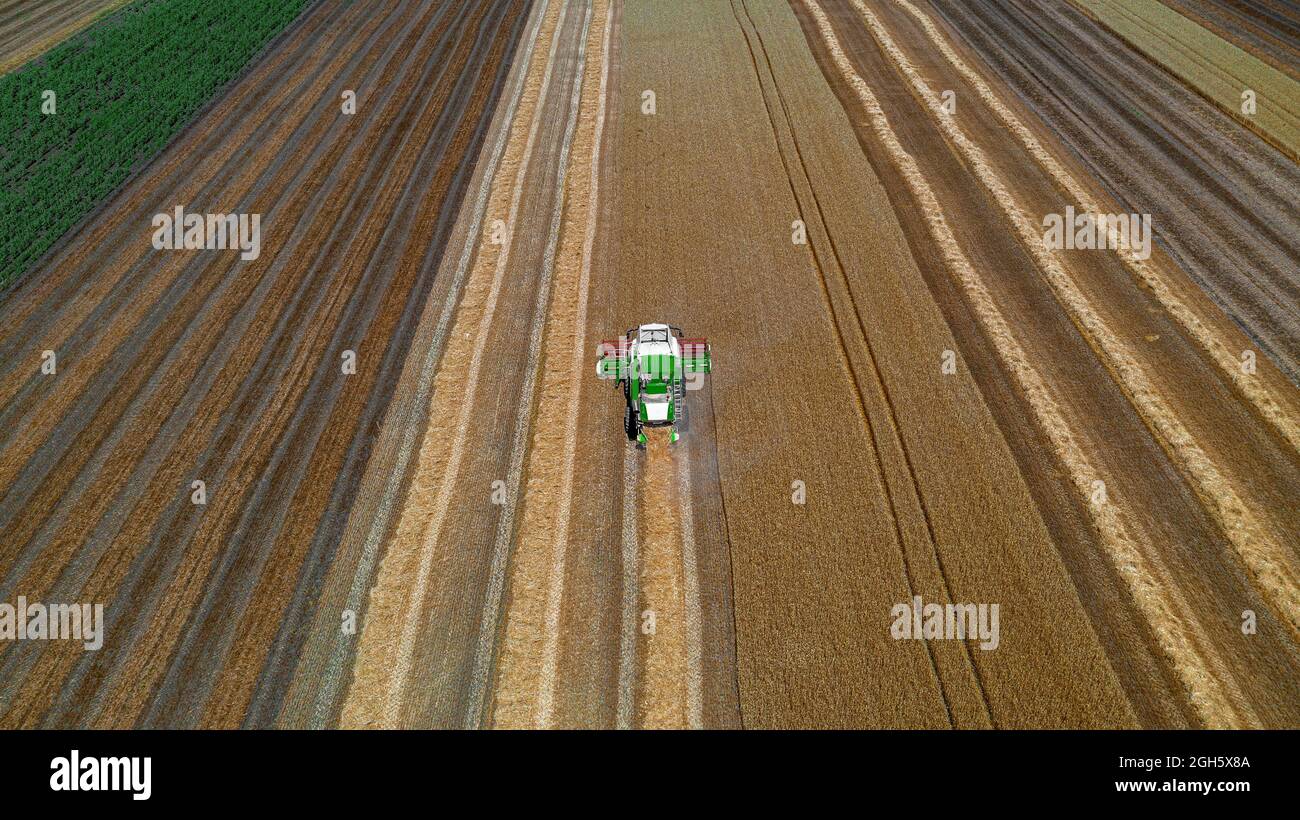 Aerial shot combine harvester working hi-res stock photography and ...