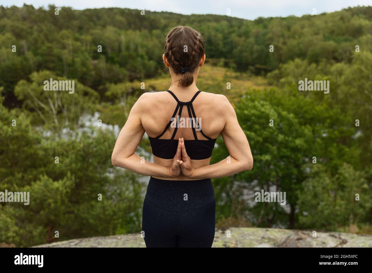 Hands clasped behind back hi-res stock photography and images - Alamy