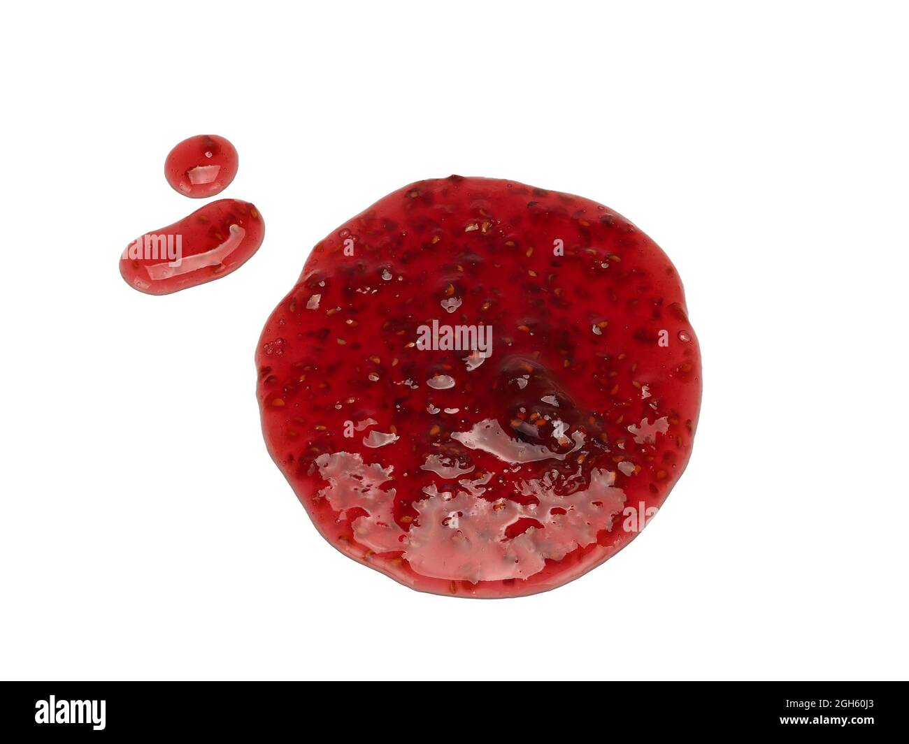 Round spot of raspberry jam isolated on white background from top view ...