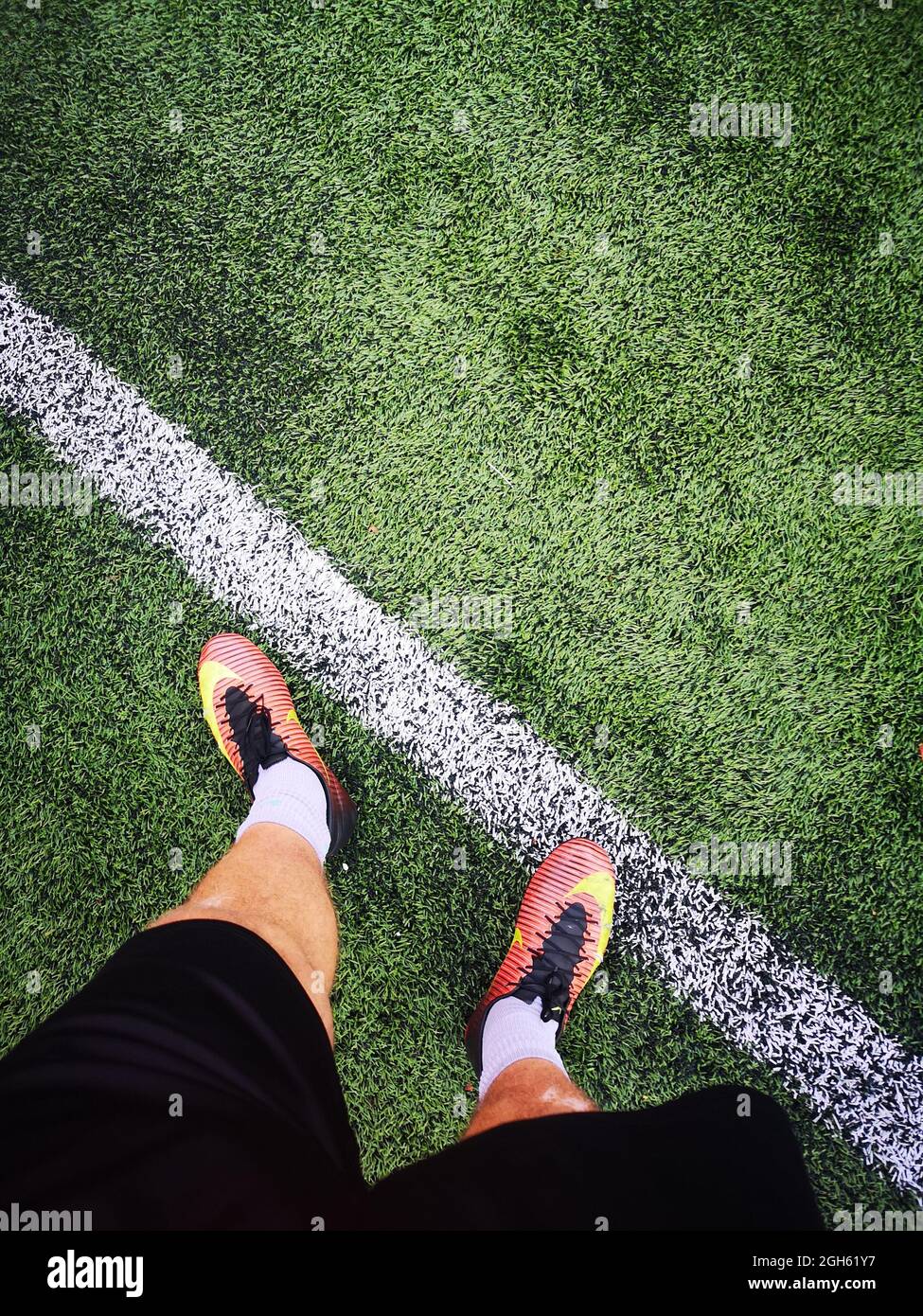 Soccer football player standing feet hi-res stock photography and ...
