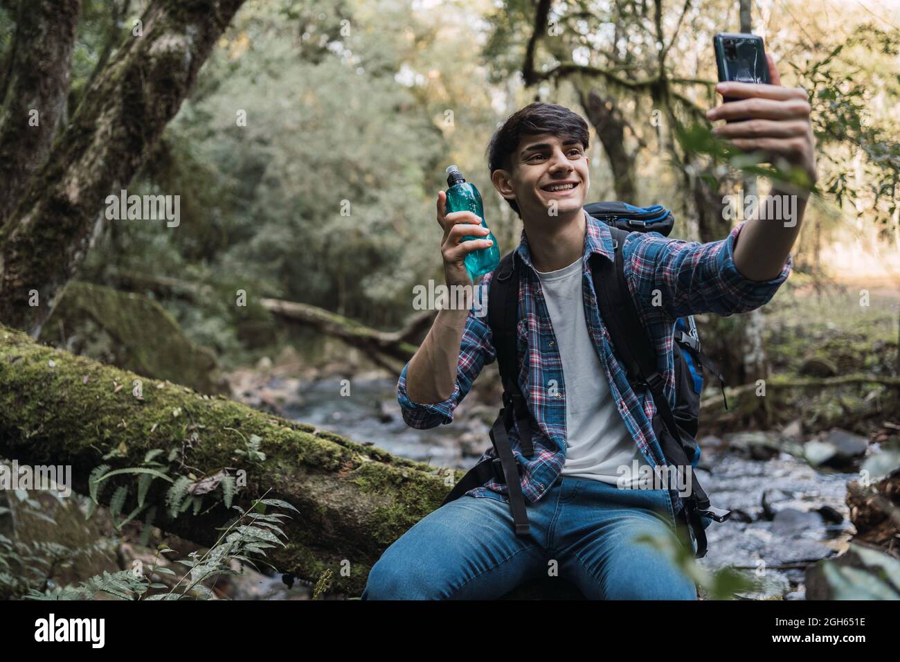 Hiker taking look waterfall hi-res stock photography and images - Alamy