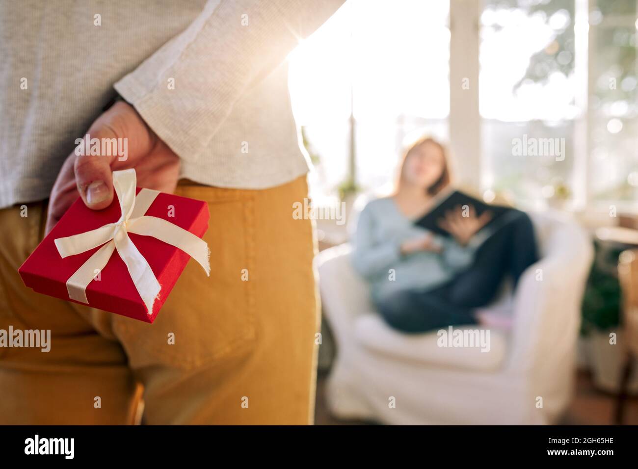 Hide behind back hi-res stock photography and images - Alamy