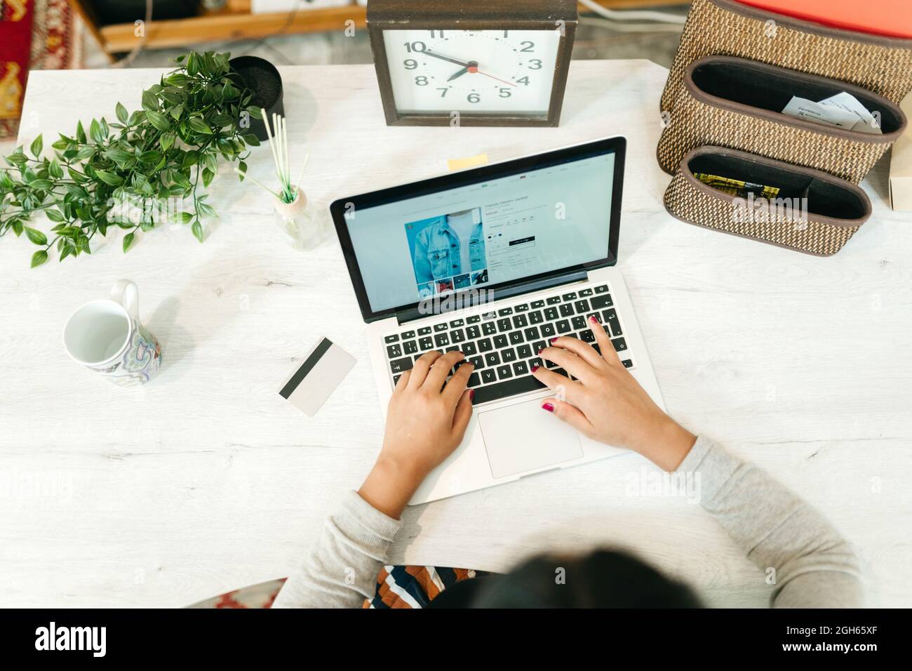 Crop anonymous male barista turning on professional coffee machine for ...