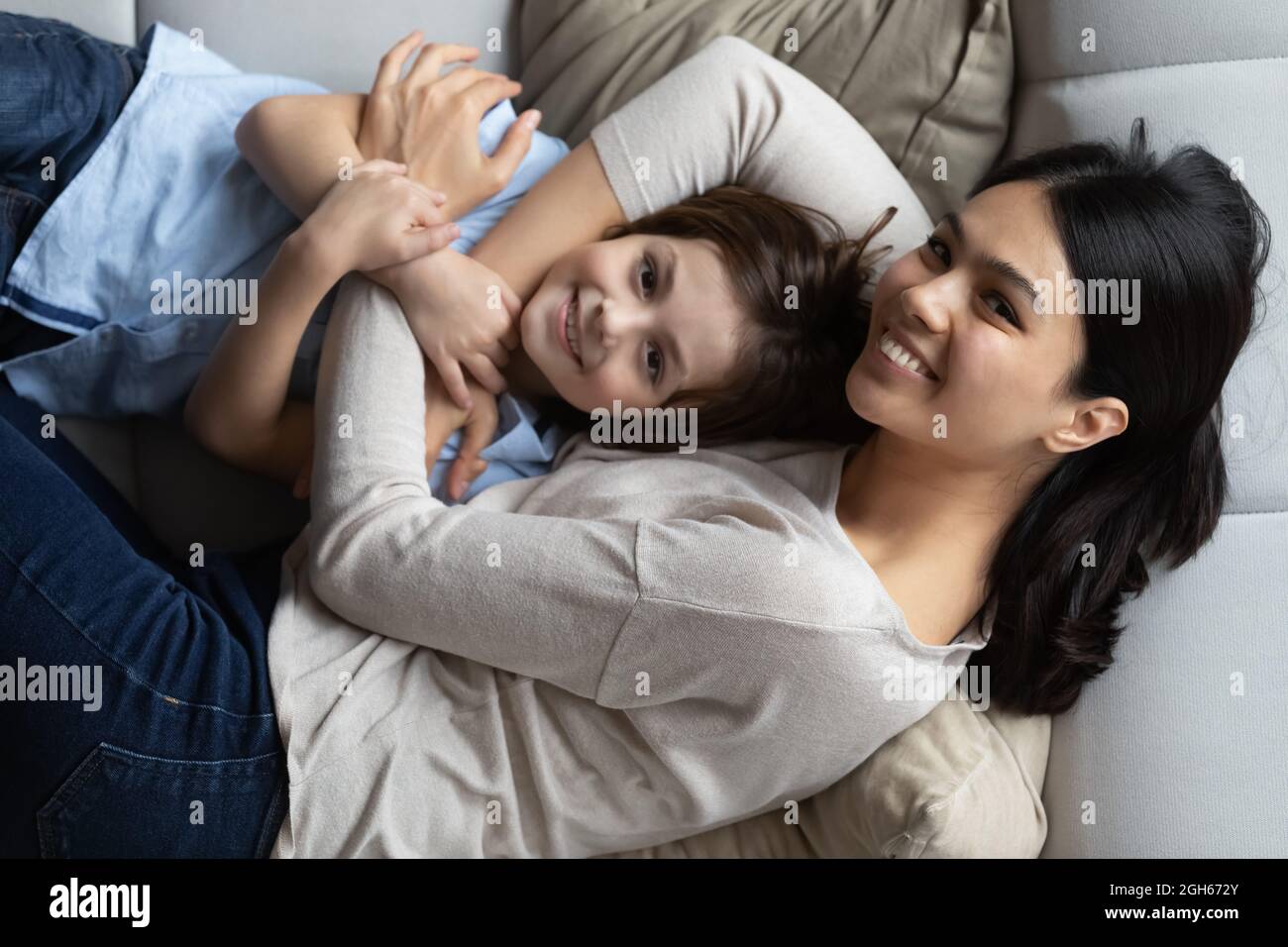 Loving young korean woman cuddling little kid son Stock Photo - Alamy