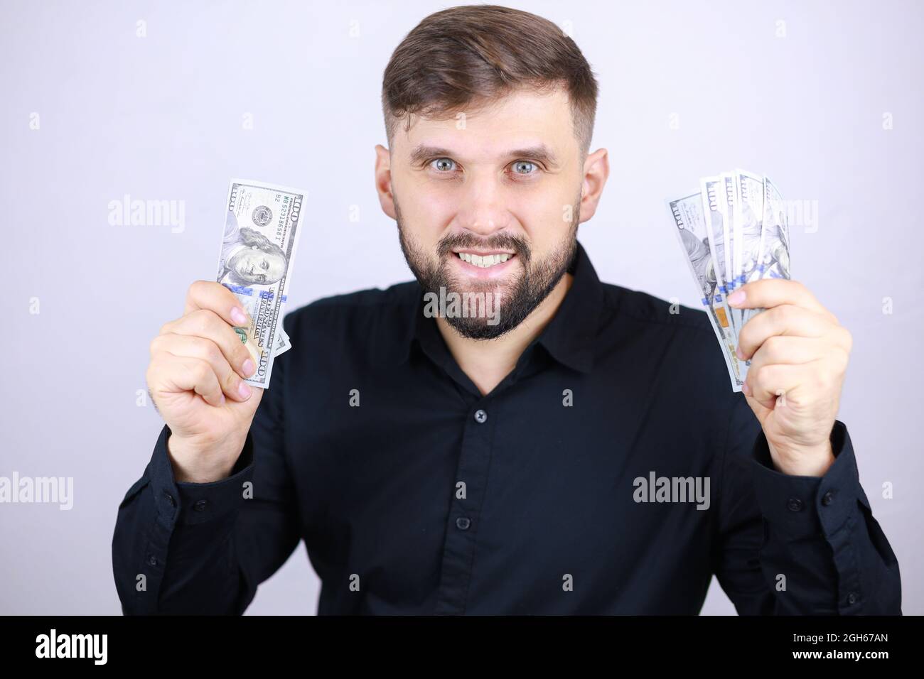 Man counts cash holds in hi-res stock photography and images - Alamy