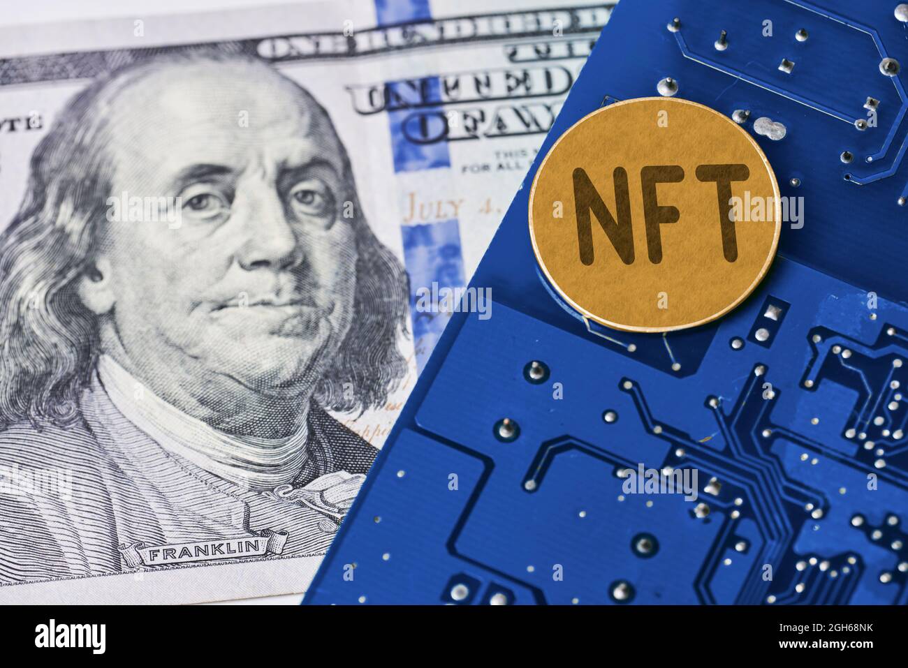 NFT coin on printed circuit board. Electronic board, us dollar and NFT ...
