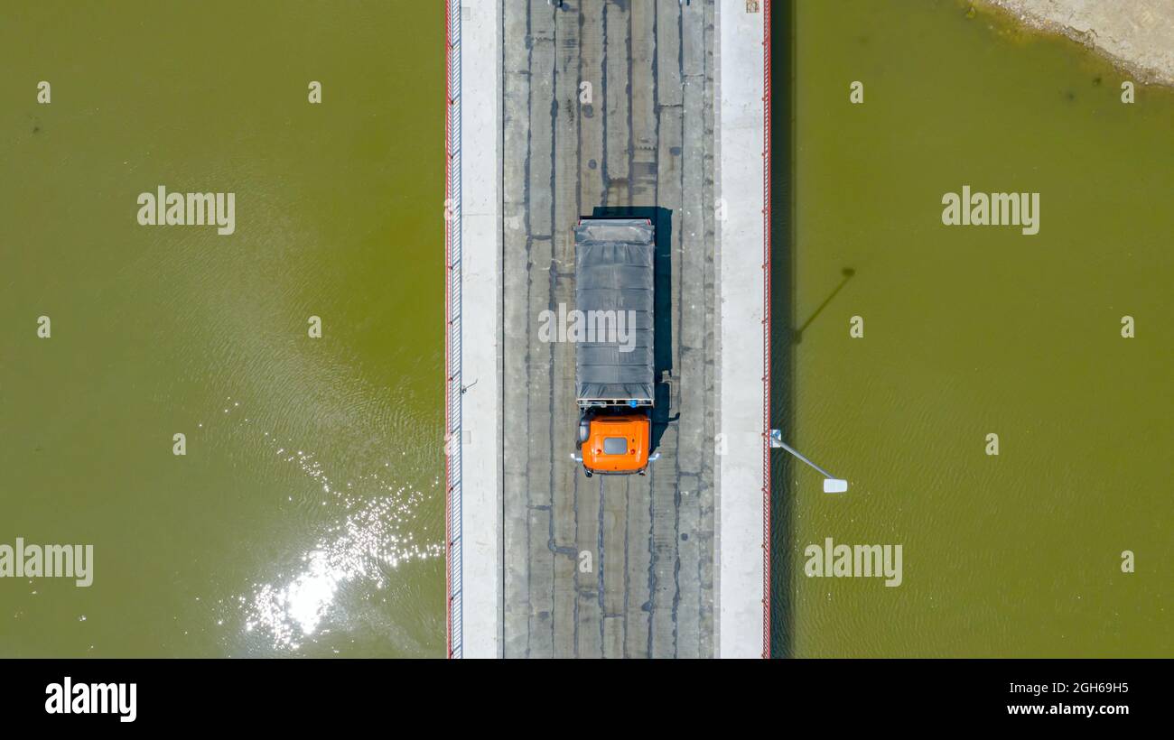 Above top view, overhead, on transportation truck delivery hot tarmac ...