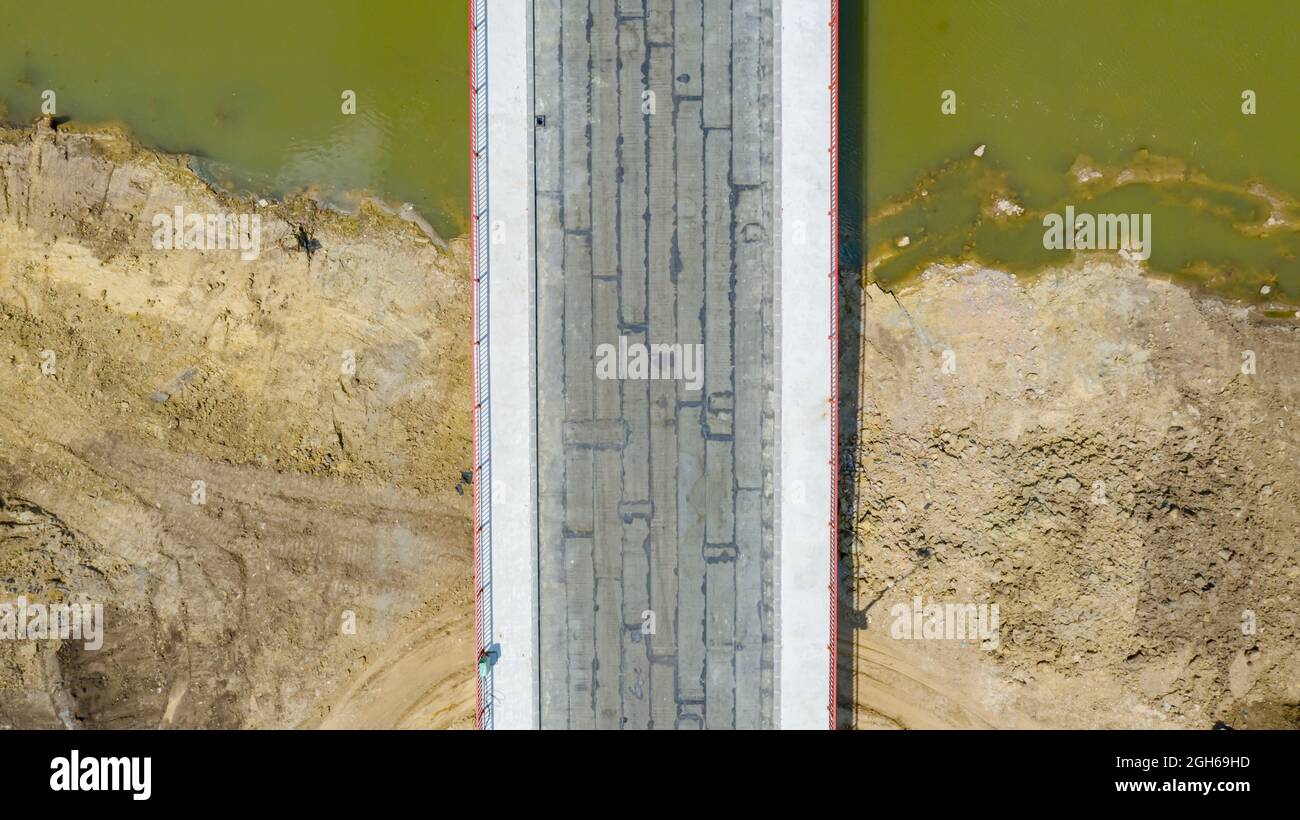 Above top view, overhead, on waterproofing layer over concrete that it ...