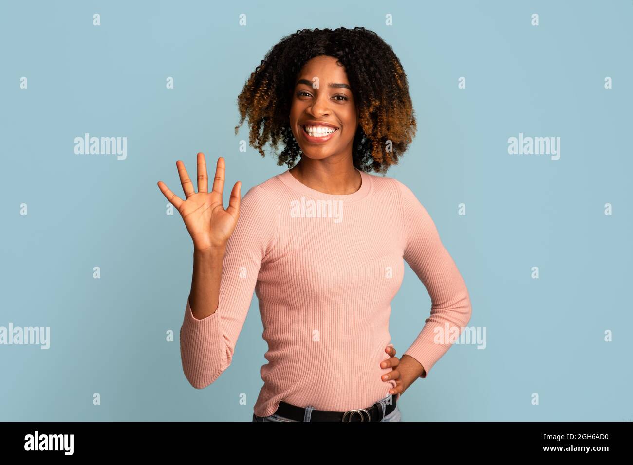 Hello. Cheerful Friendly Young African American Woman Waving Hand At ...