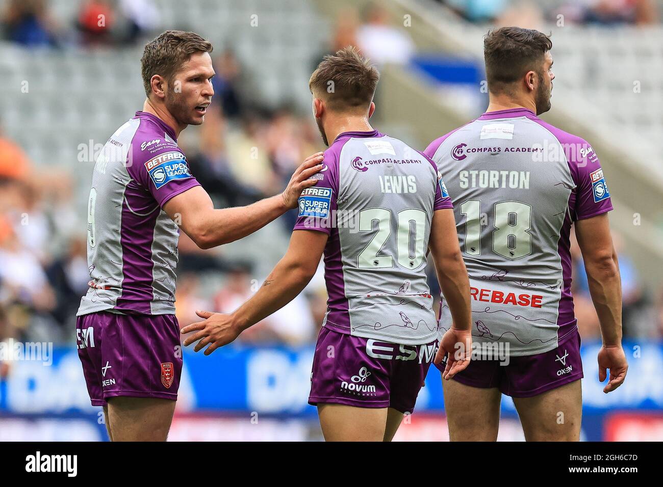Matt Parcell (9) of Hull KR gives his team mate Mikey Lewis (20) word ...