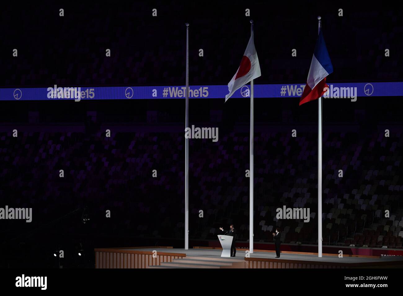 (L-R) Andrew Parsons IPC President delivers a speech alongside Seiko ...