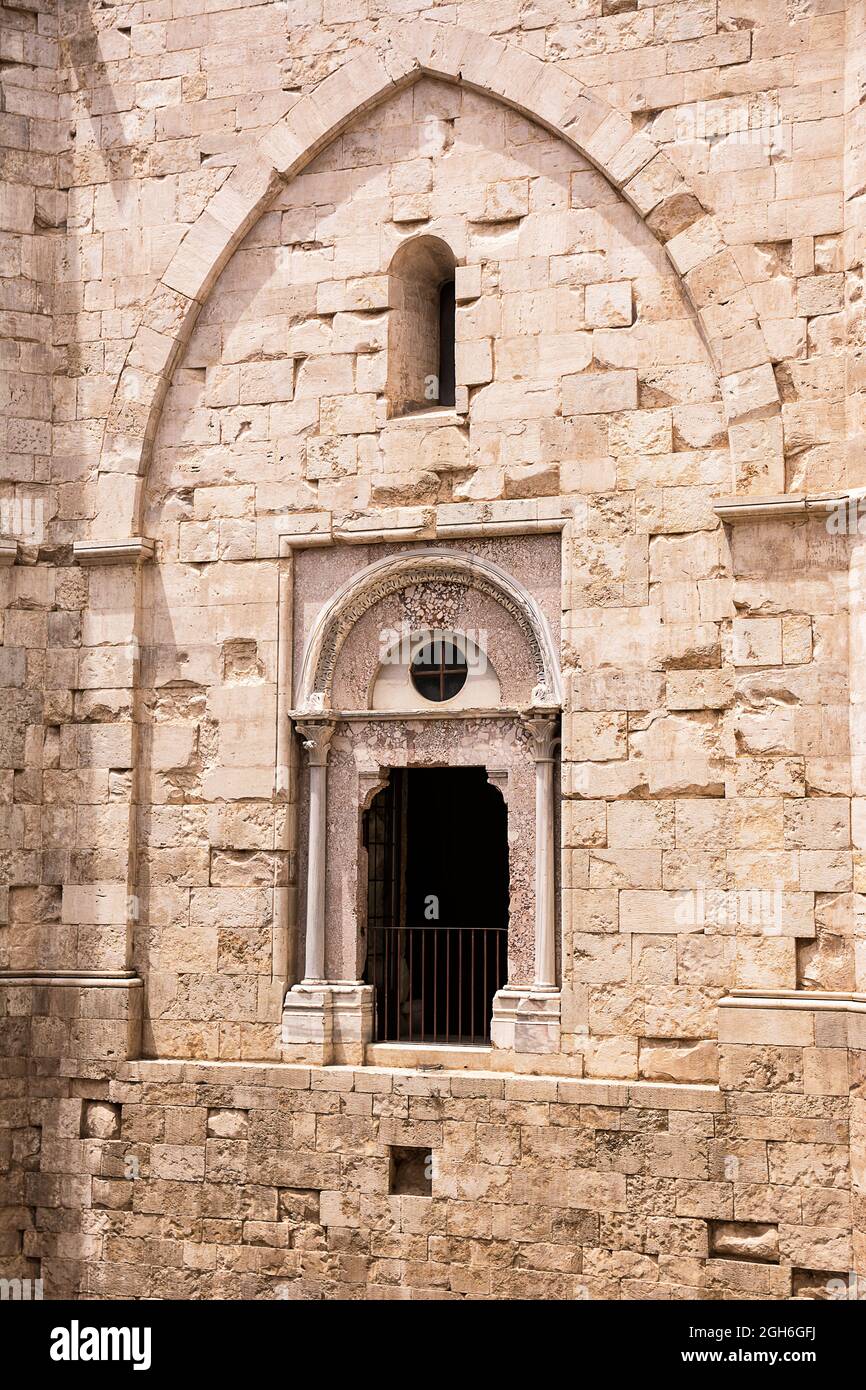 Andria, Italy - 18 June 2021: Internal window with arches, columns and ...