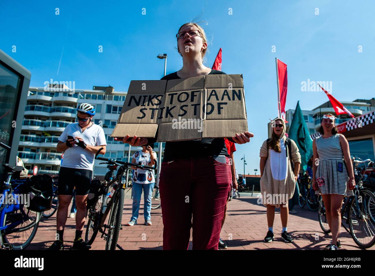 Amsterdam, Netherlands. 05th Sep, 2021. A climate activist holds a ...
