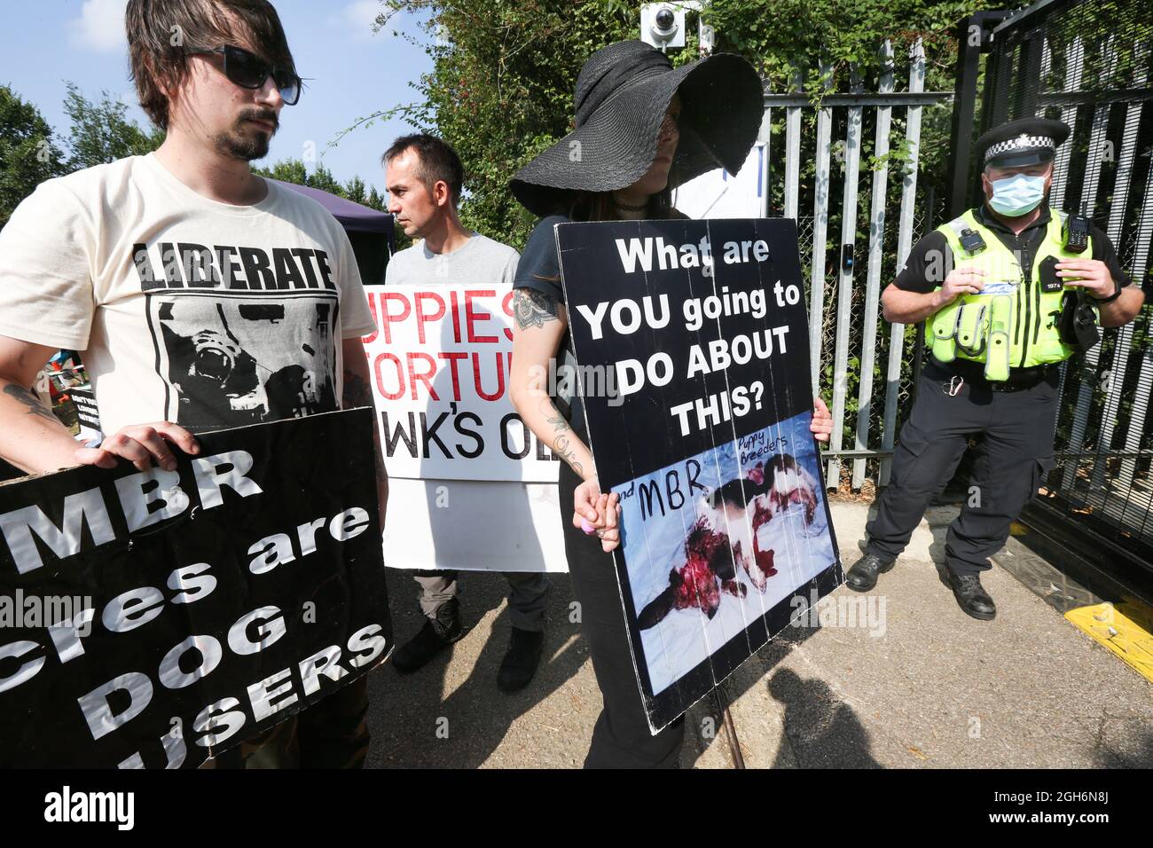 Protesters hold up placards during the protest at Camp Beagle. 67 days ...