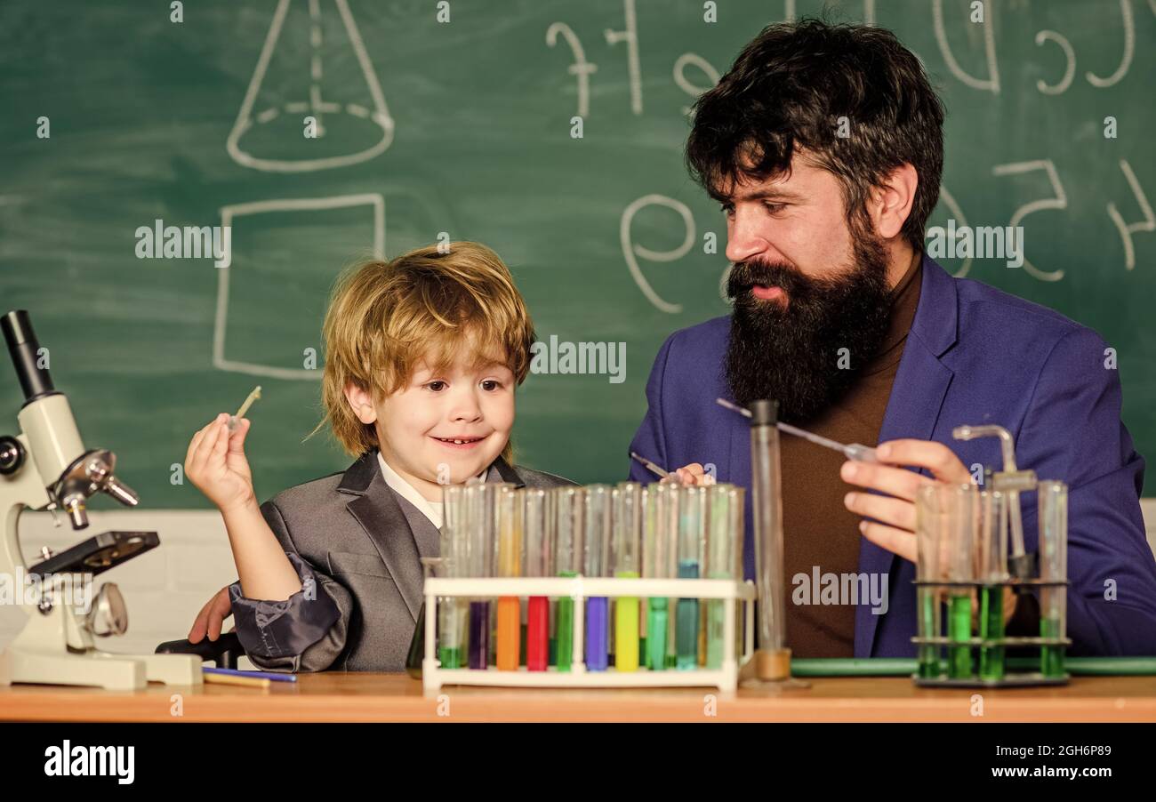 Genius minds. Genius toddler private lesson. Teacher child test tubes ...