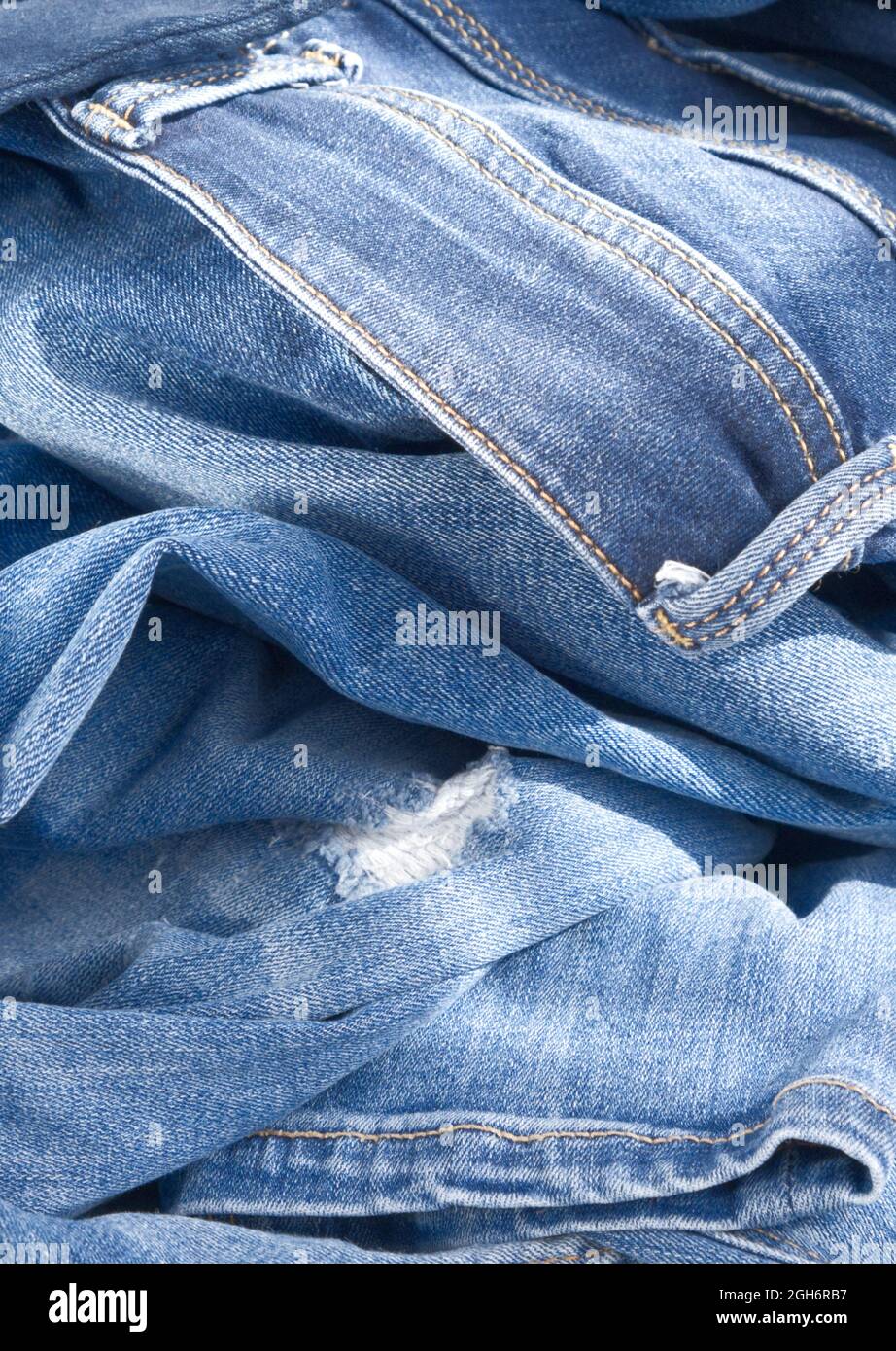 Crumpled blue jeans hi-res stock photography and images - Alamy