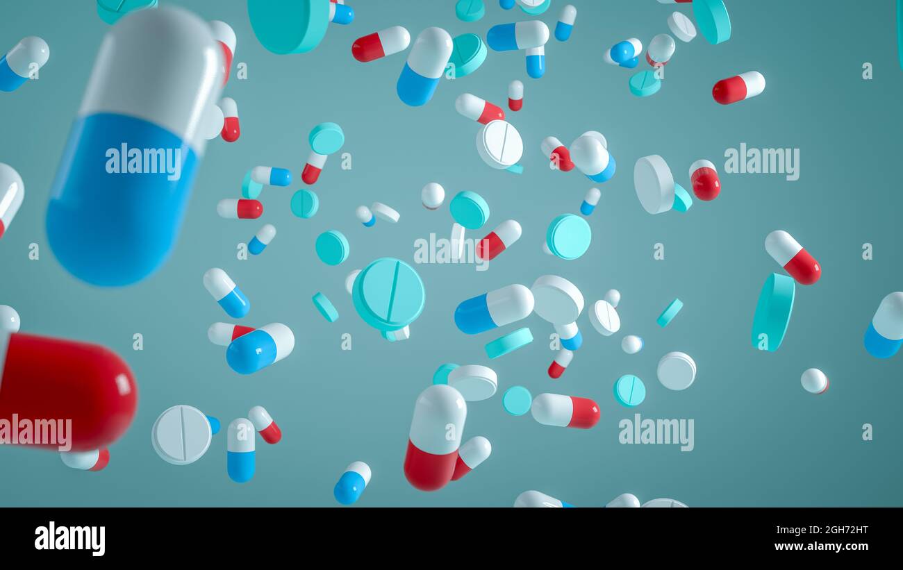 Blue red tablets falling on hi-res stock photography and images - Alamy