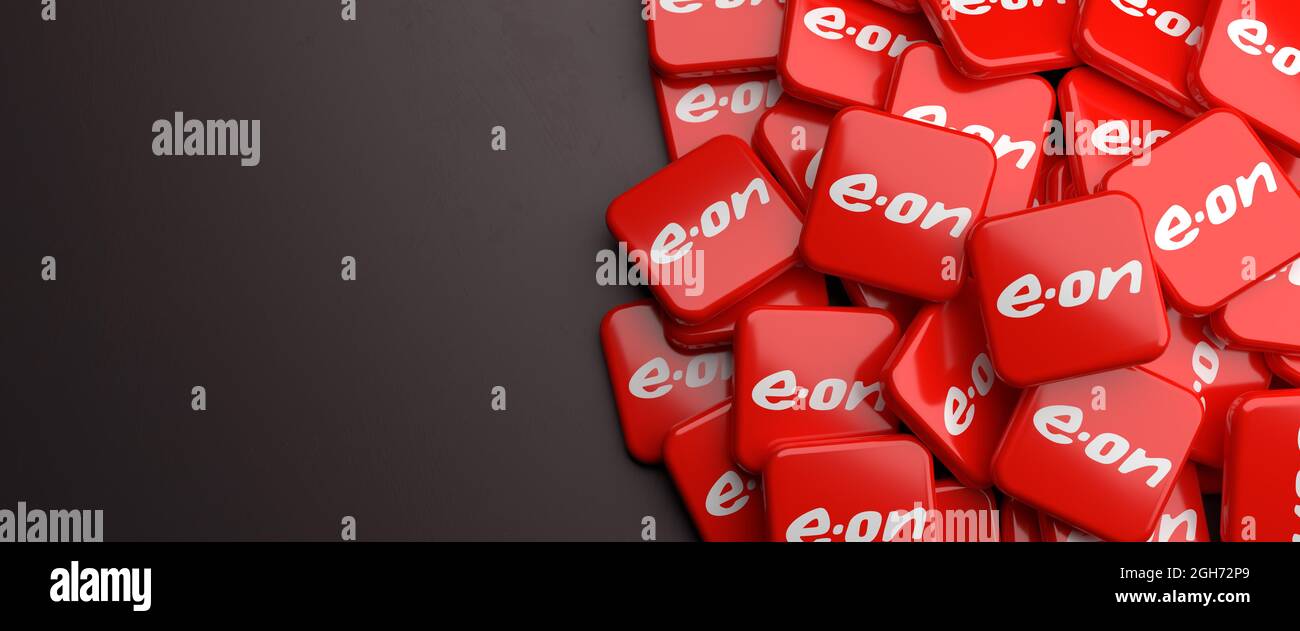 Logos of the German electric utility service provider E.ON on a heap on ...