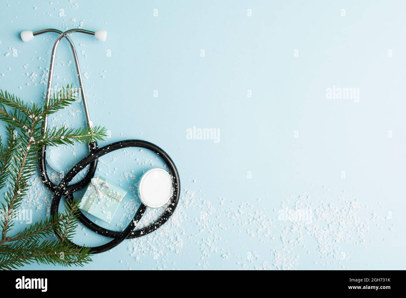 Christmas medical concept with stethoscope, gift box and christmas tree ...