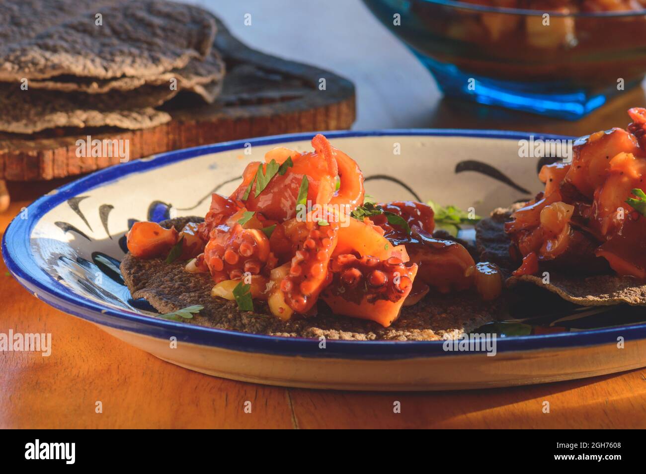 Octopus Ceviche on Blue Corn Tostadas, Mexican Seafood Dish Stock Photo ...